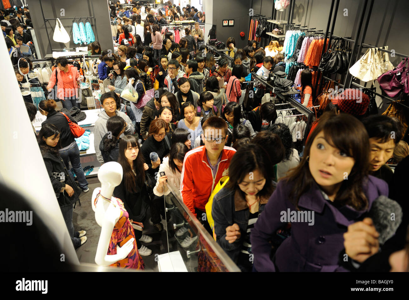 Chinese consumers shopping at the first H M store in Beijing China 23 ...