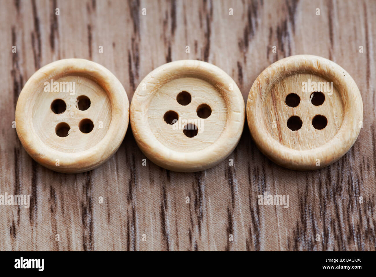 Three wooden buttons hi-res stock photography and images - Alamy