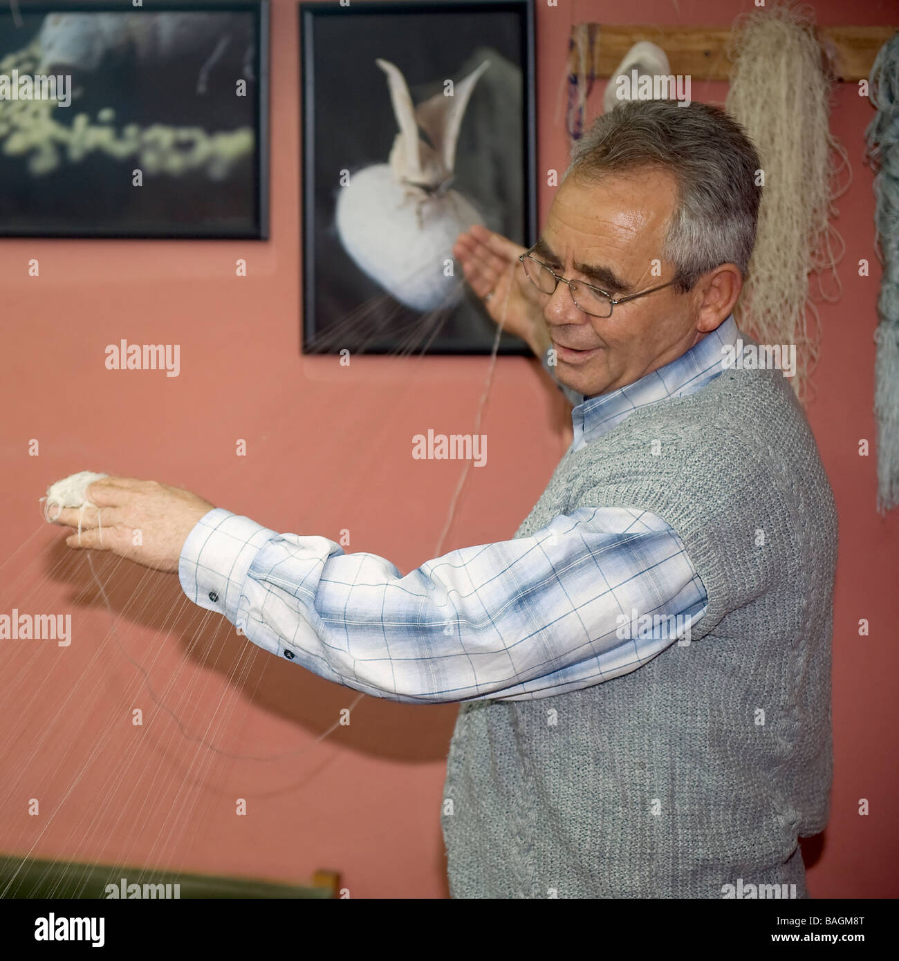 Man extracting silk filaments from cocoons Antalya Turkey Stock Photo ...