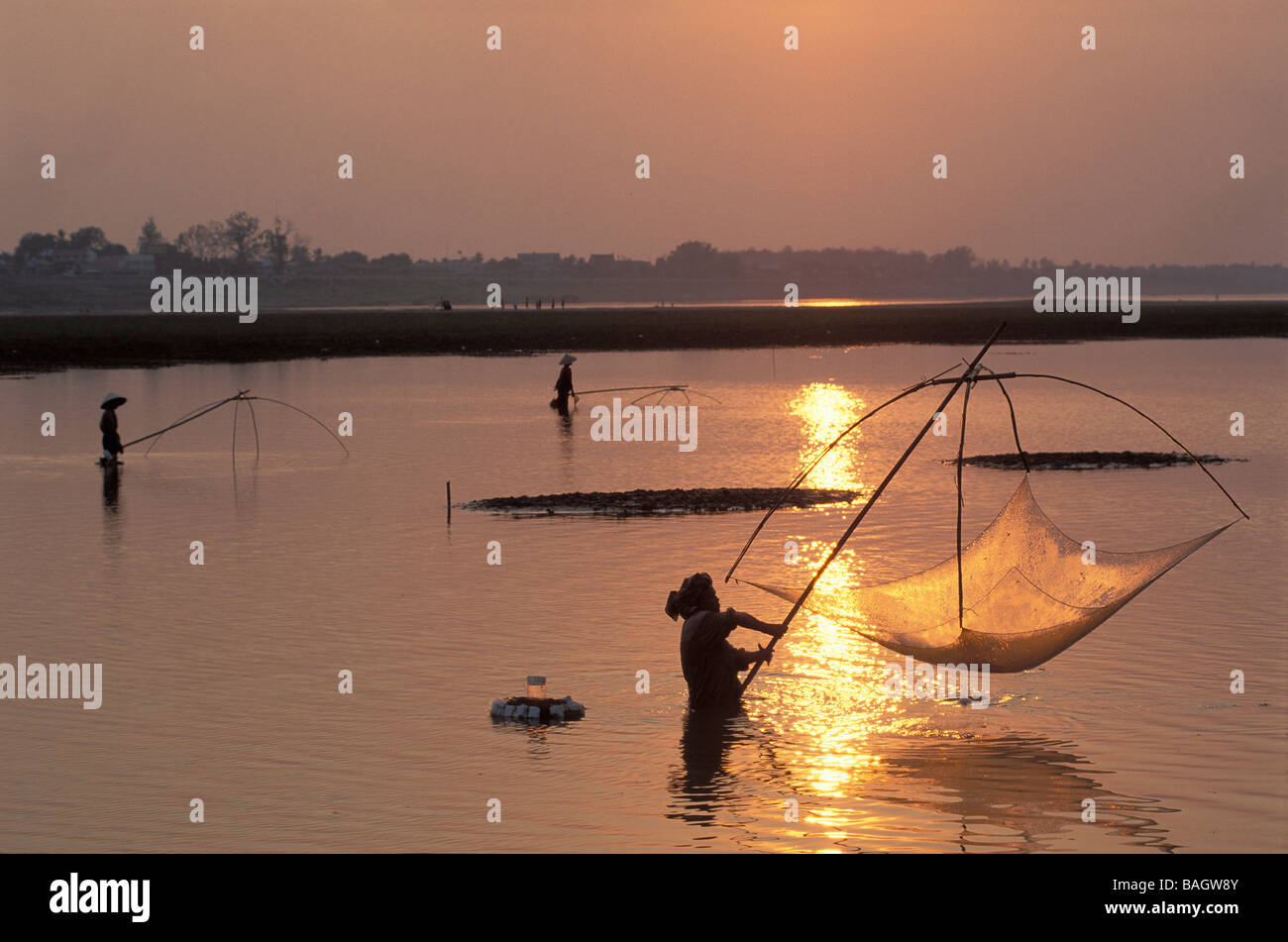 Laos, Vientiane, Mekong river, fishing at sunset Stock Photo - Alamy