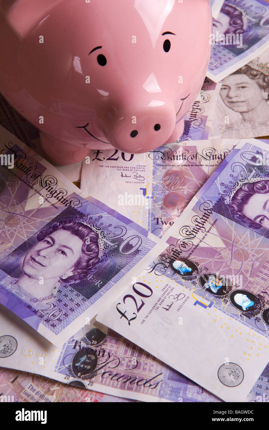 Piggy bank with British Money Stock Photo - Alamy