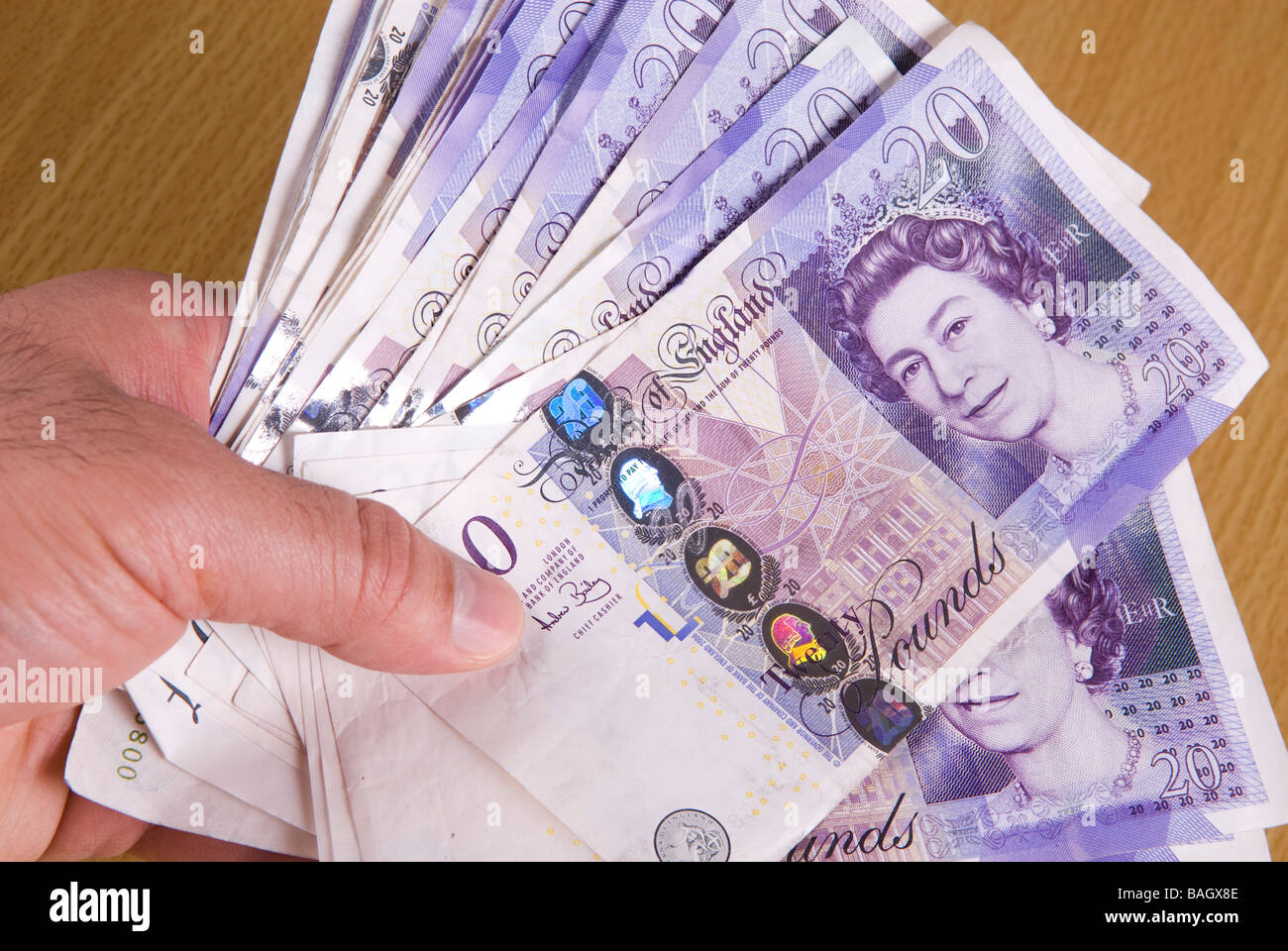 Hand Grabbing Money High Resolution Stock Photography and Images - Alamy