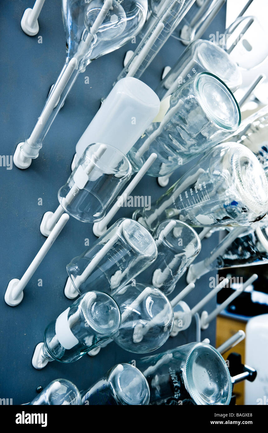 Science research lab- various bottles and jars hanging on wall Stock ...