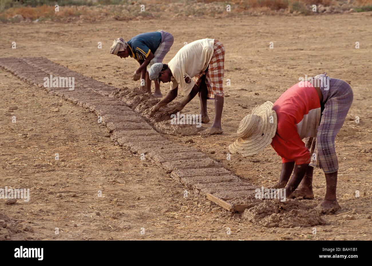 Making earth bricks hi-res stock photography and images - Alamy