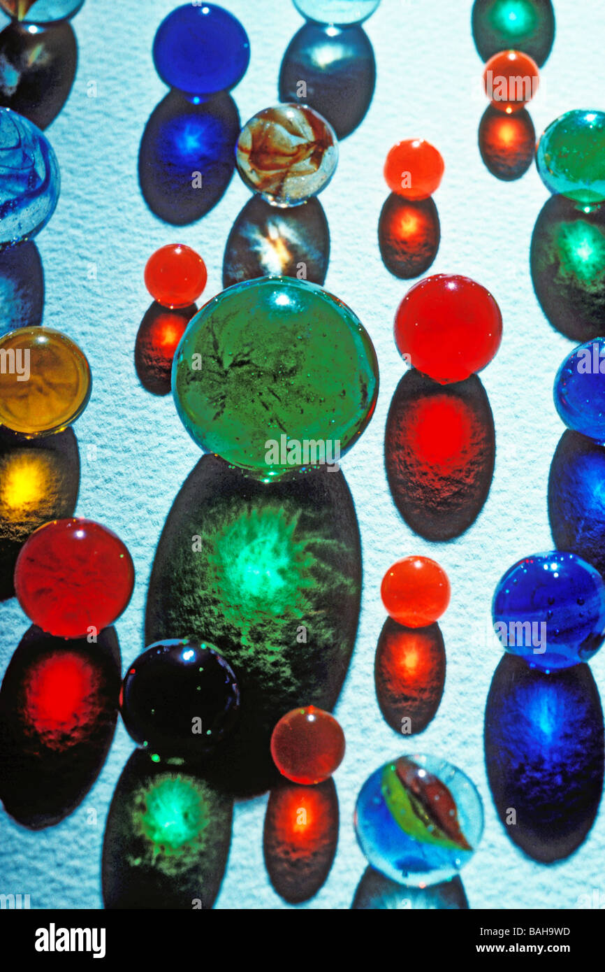 Marbles and their shadows Stock Photo - Alamy