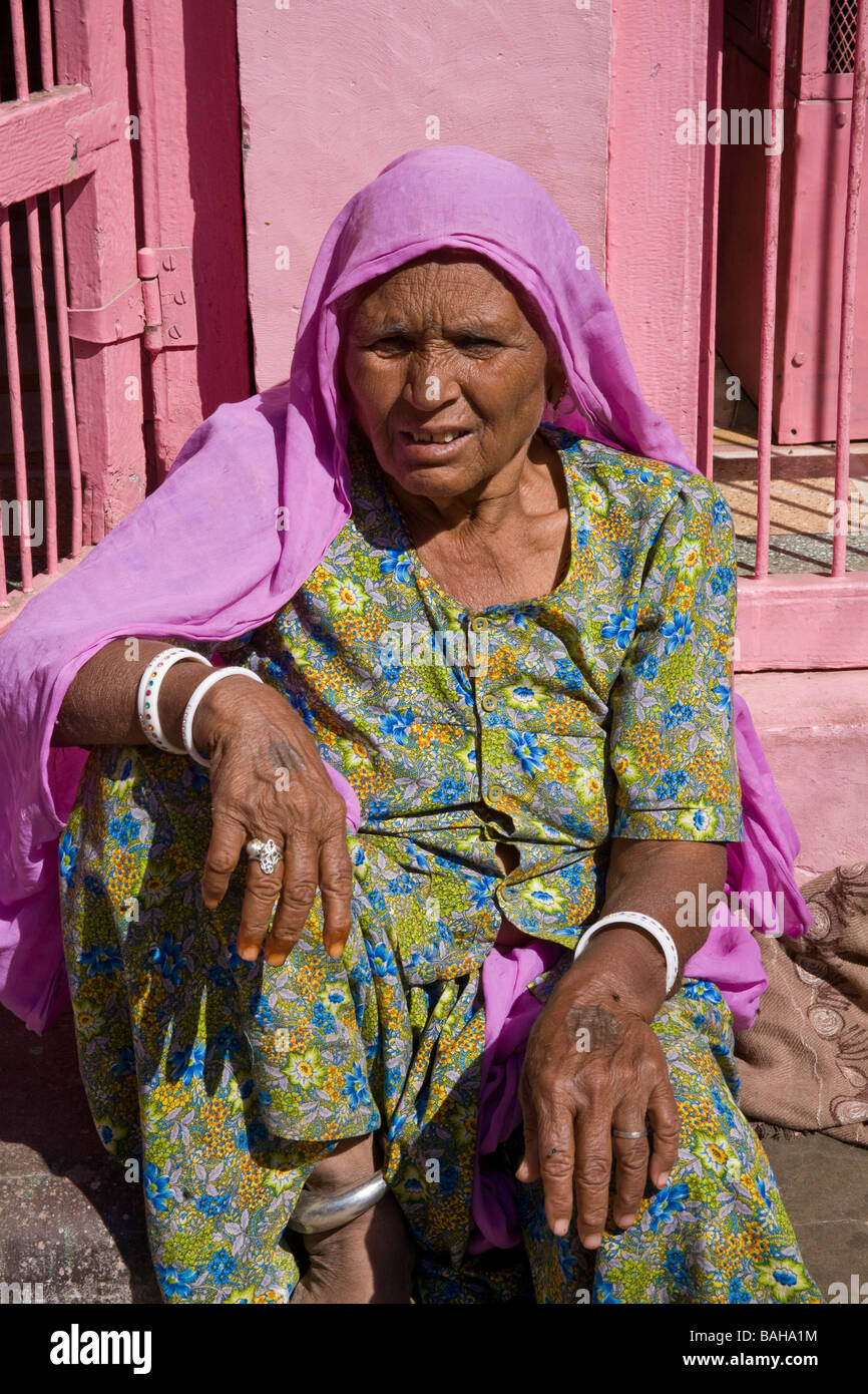 Woman sitting on the doorstep outside her house, Osian, near Jodhpur ...