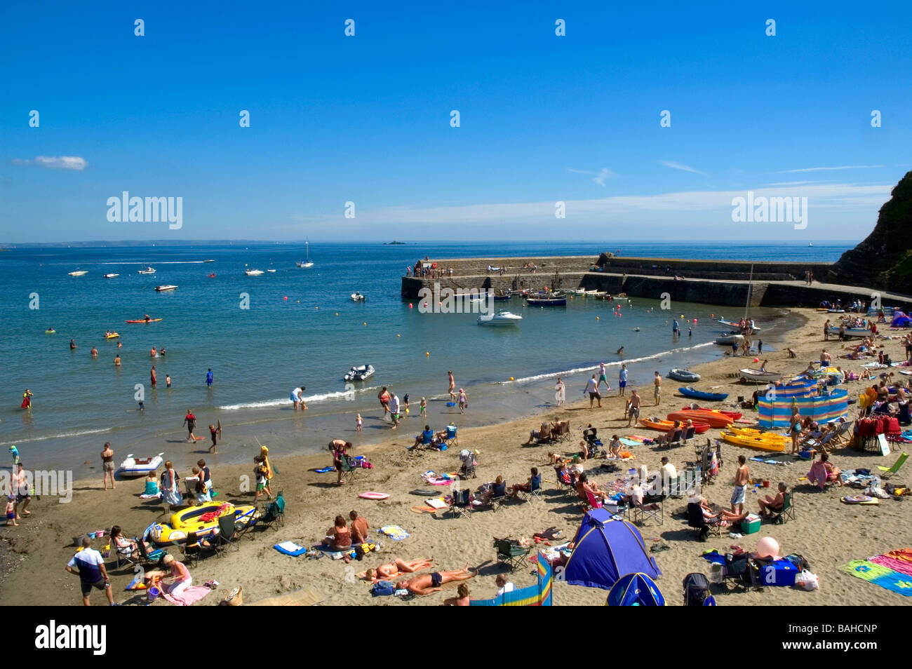 people on the beach at gorran haven in cornwall,uk Stock Photo - Alamy