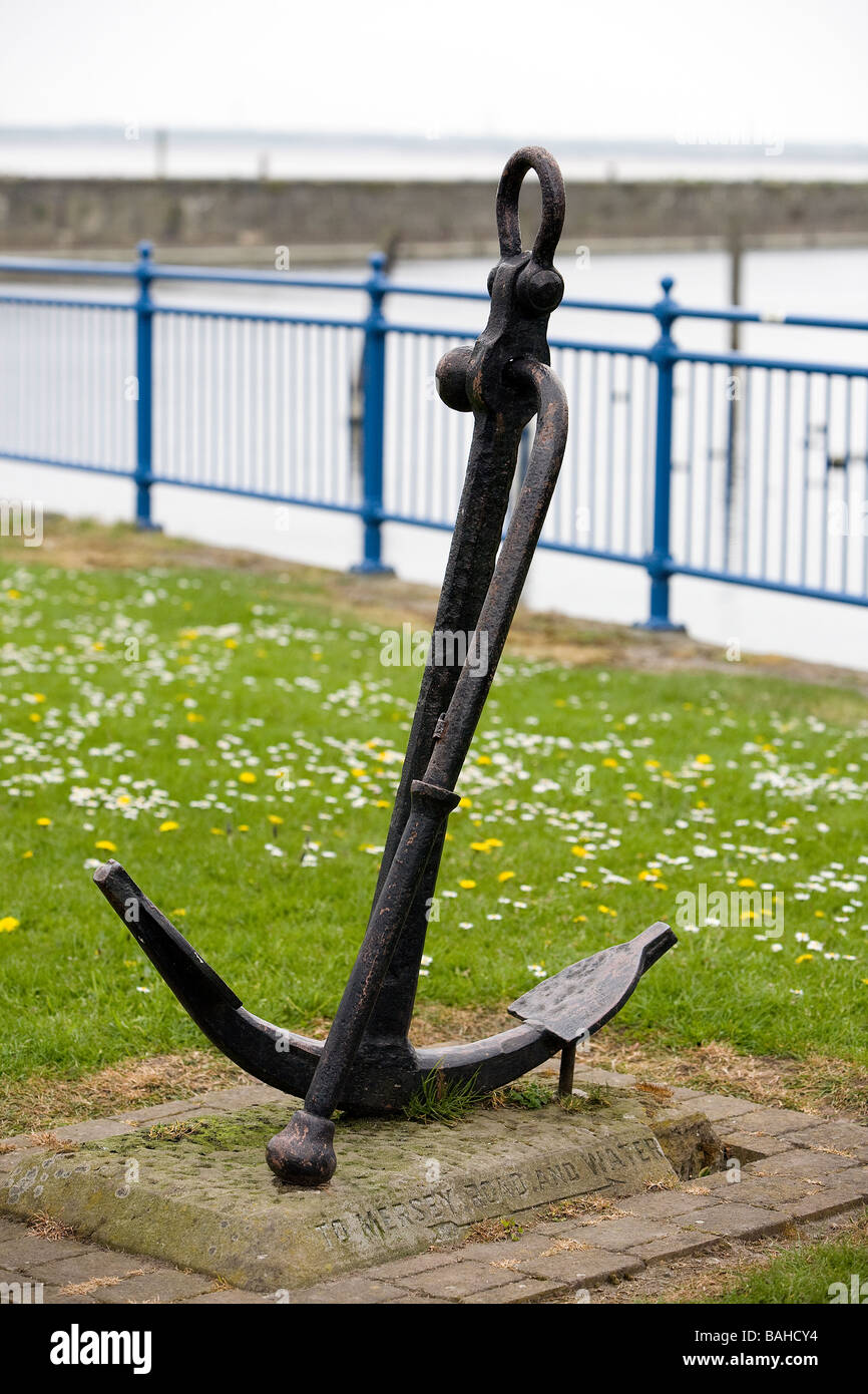 A memorial anchor stands proud in Runcorn with the River Mersey and ...