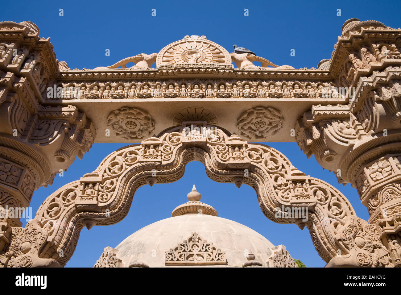 Intricate stone carved arch and dome, Mahavira Jain Temple, Osian, near ...
