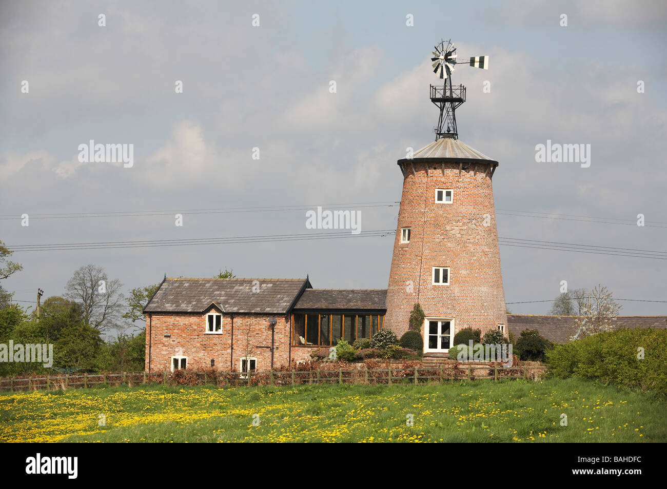 Restored windmill now a private house Stock Photo - Alamy