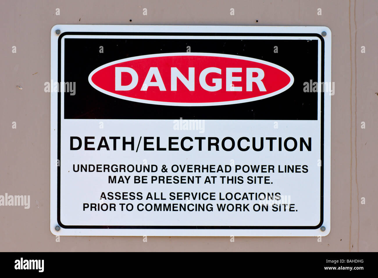 A Danger sign warning of the risk of Electrocution Stock Photo - Alamy