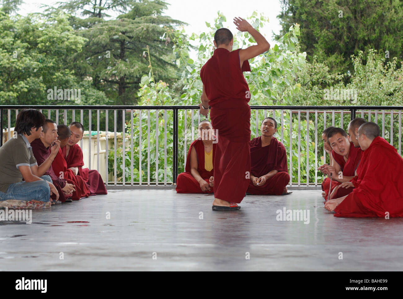 Tibetan Monks debate Buddhist philosophy at the Tsuglagkhang Temple in ...