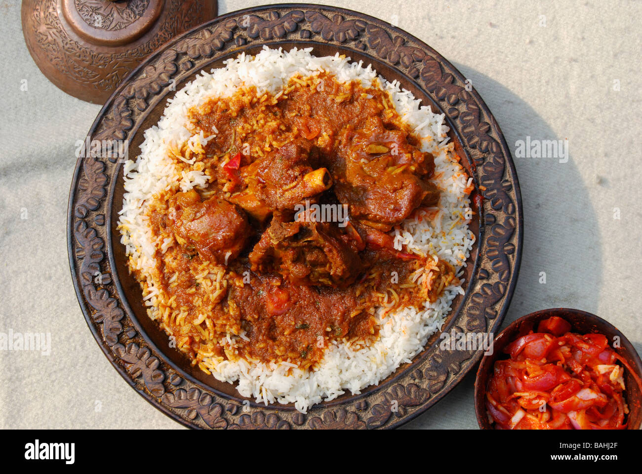 Rogan josh is an aromatic mutton curry made from lamb or goat cooked in ...