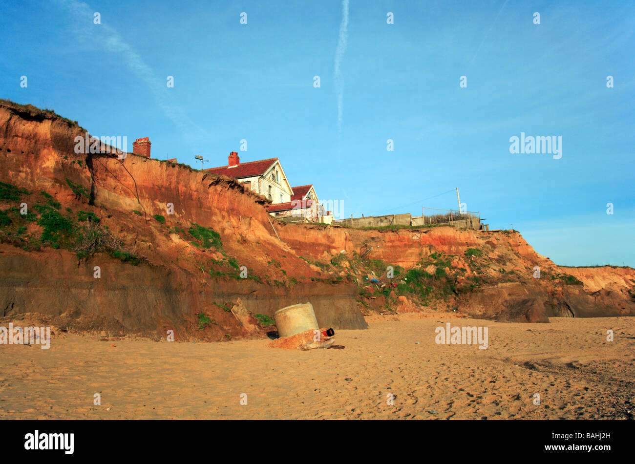 Eroding cliffs and beach at Happisburgh, Norfolk, UK, including ...