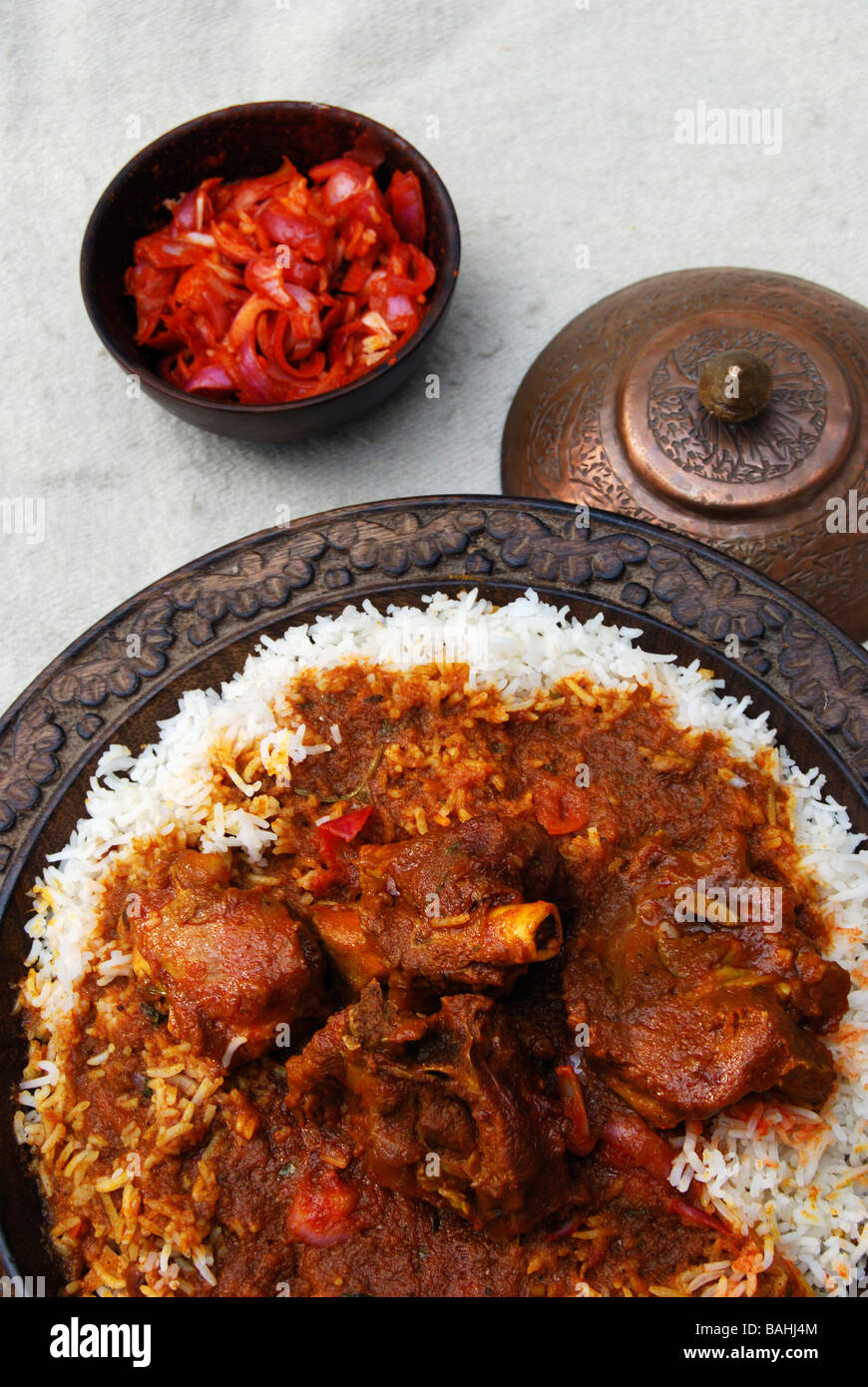 Rogan josh is an aromatic mutton curry made from lamb or goat cooked in ...