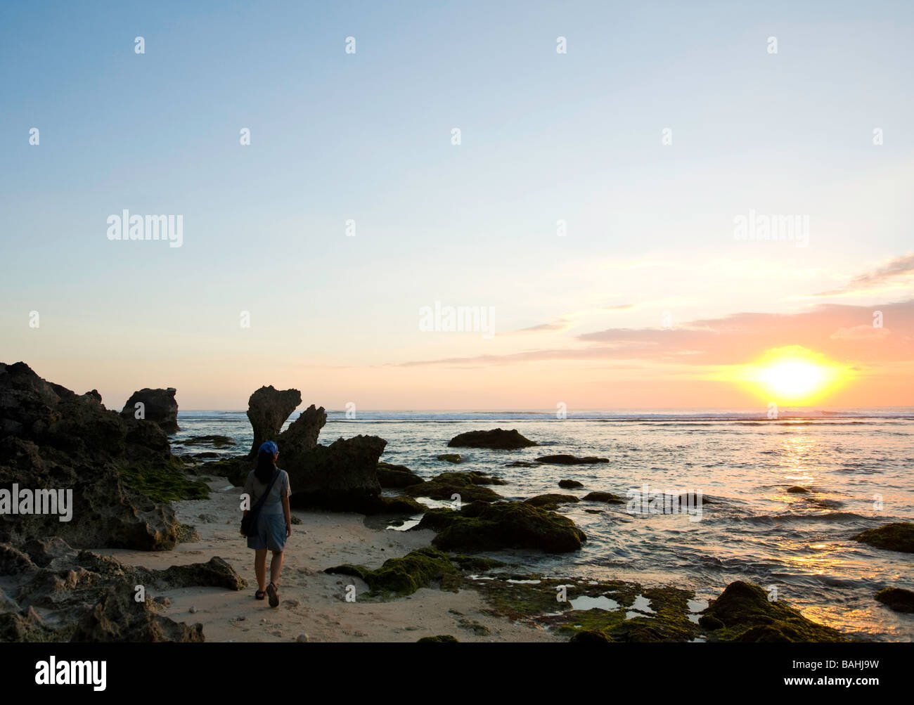 Girl walking over rocks hi-res stock photography and images - Alamy
