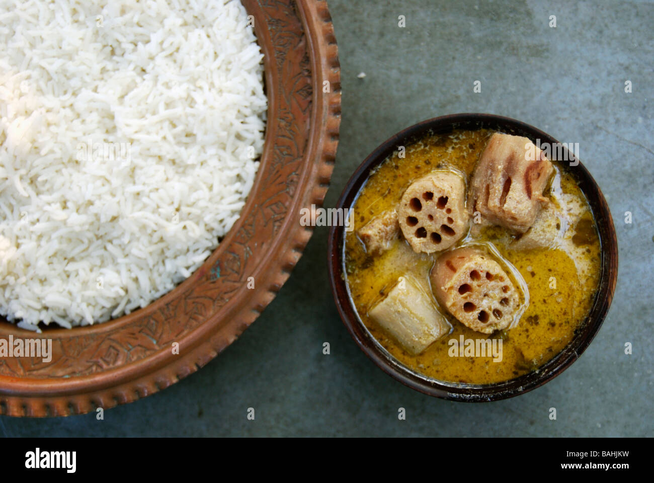 Lotus curry is an Indian dish made of lotus stem cooked in tomato onion ...