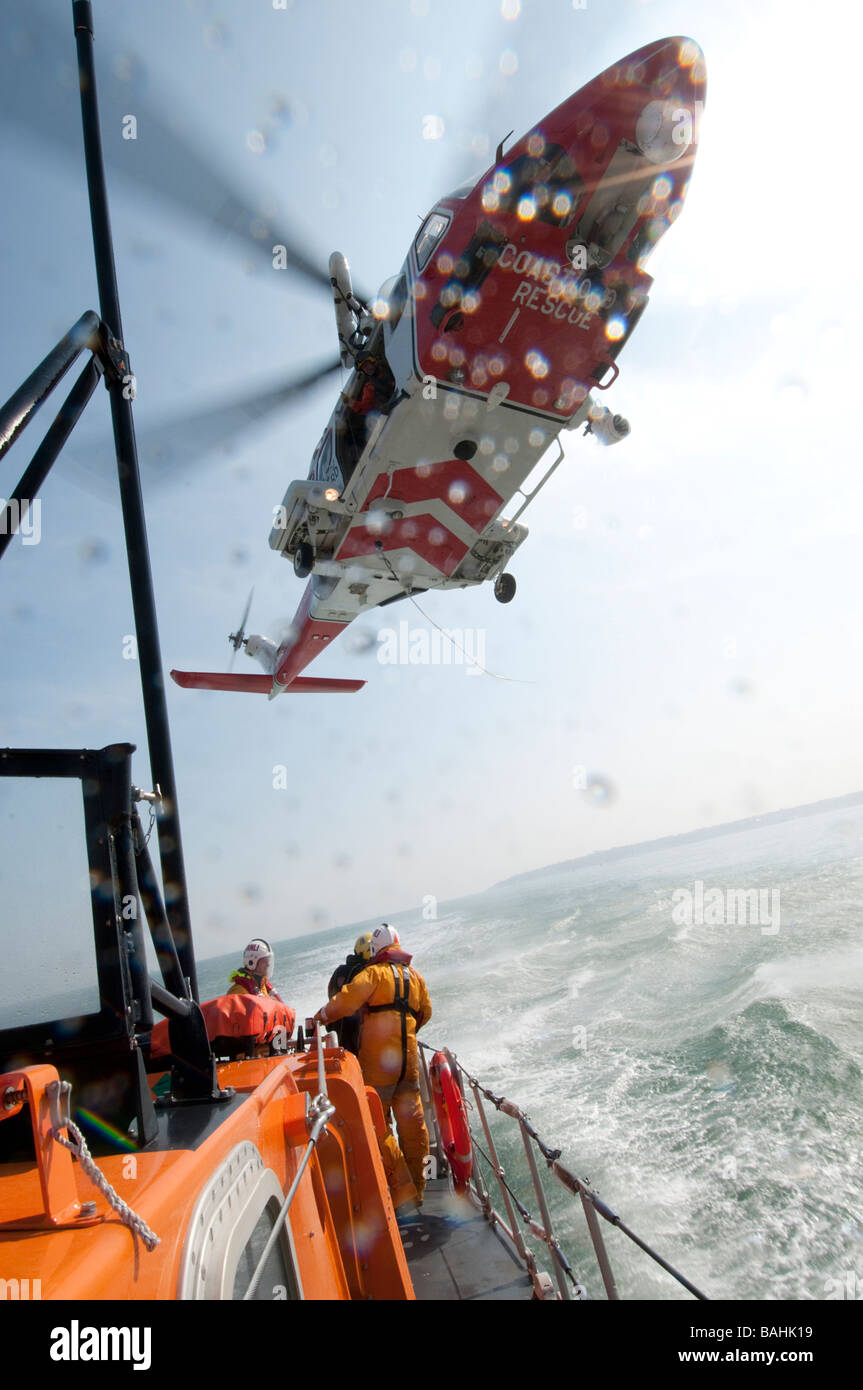 Calshot lifeboat and coastguard helicopter on exercise in the Solent ...