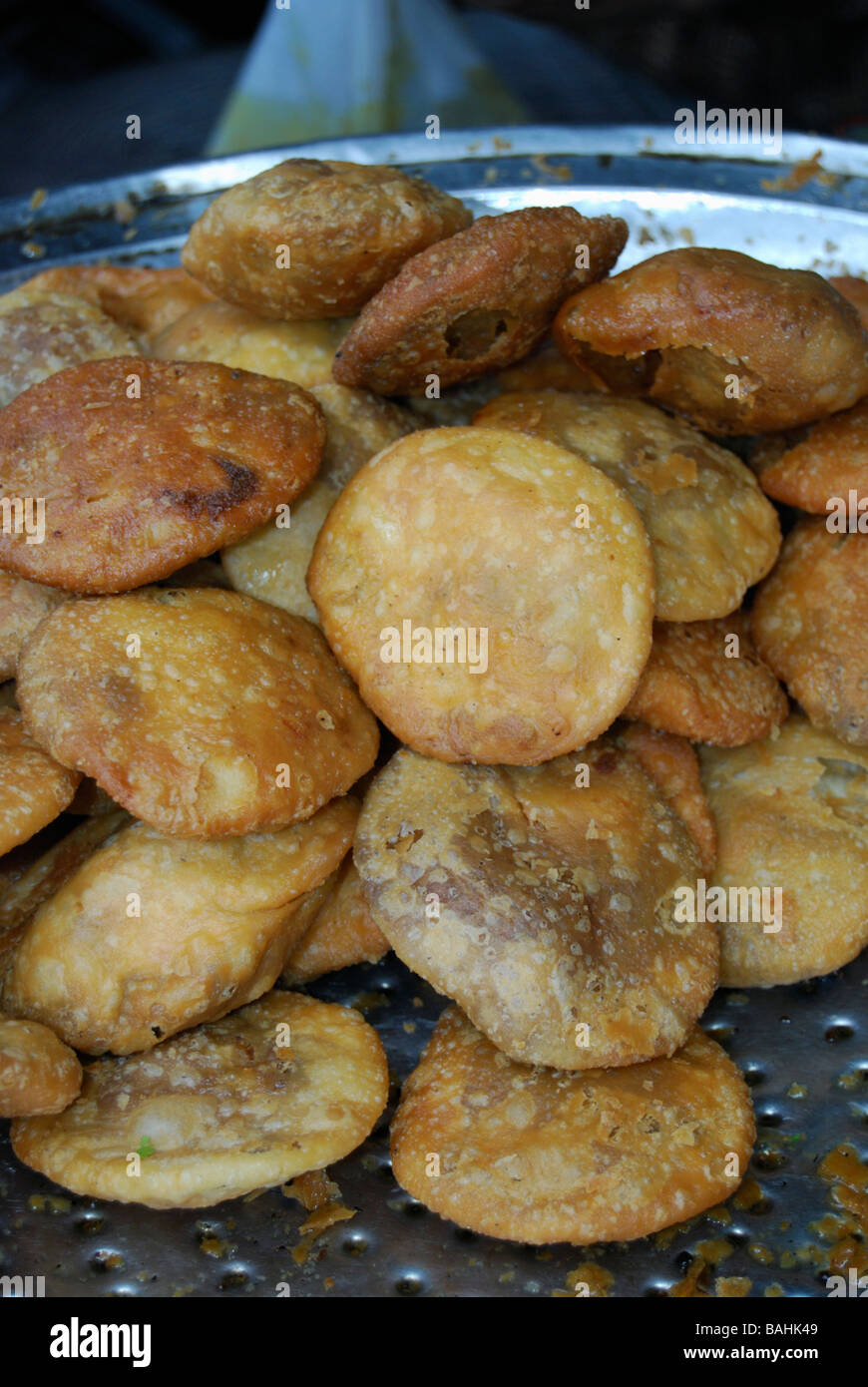 Kachori is a popular Indian spicy snack which is made from filling ...