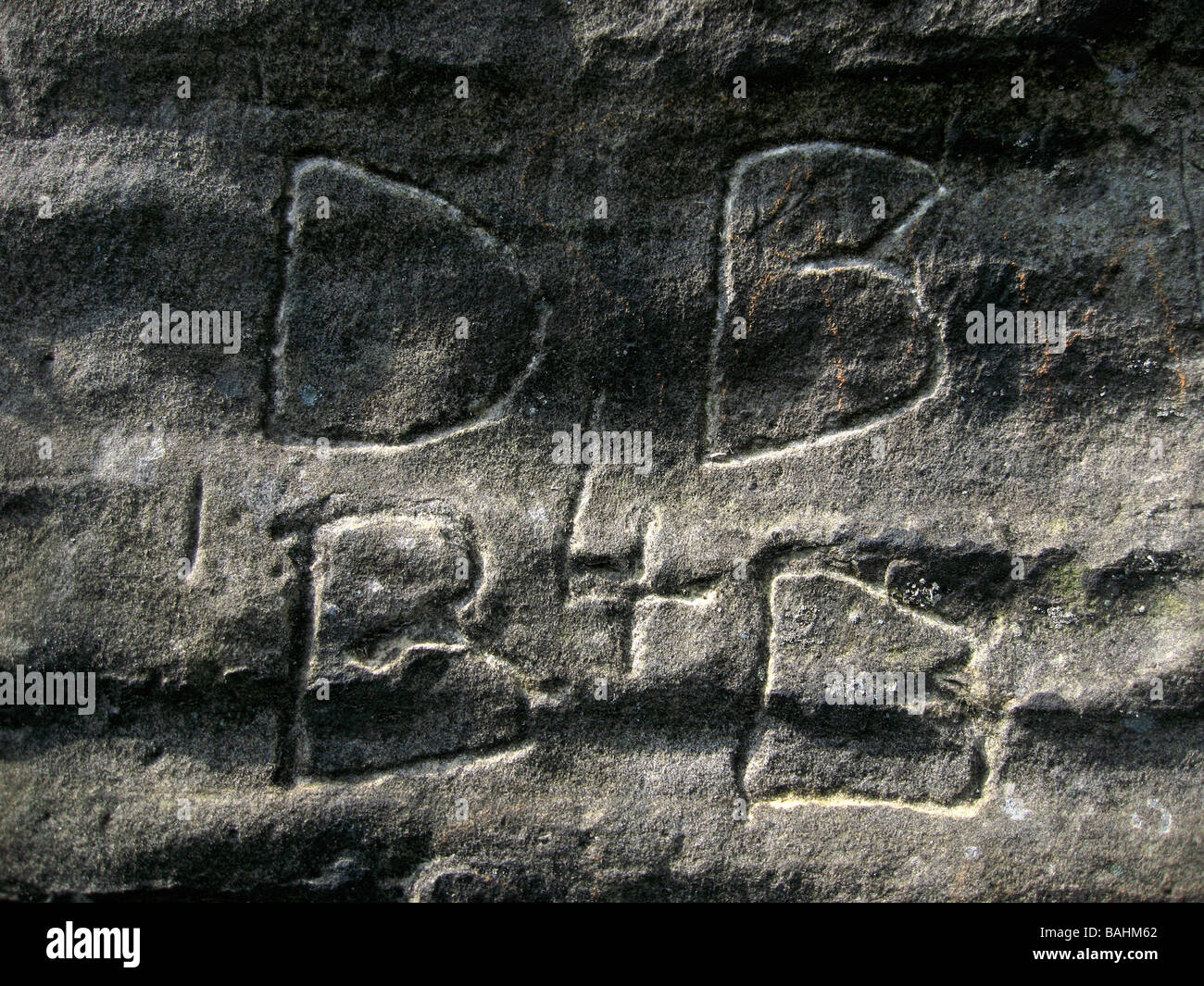 Initials On Rock Stock Photo - Alamy