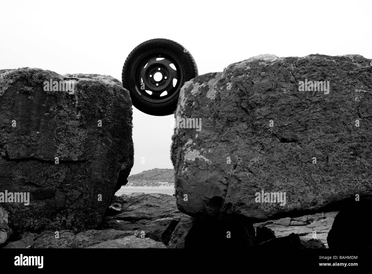 Abstract of a wheel jammed in rocks Stock Photo - Alamy