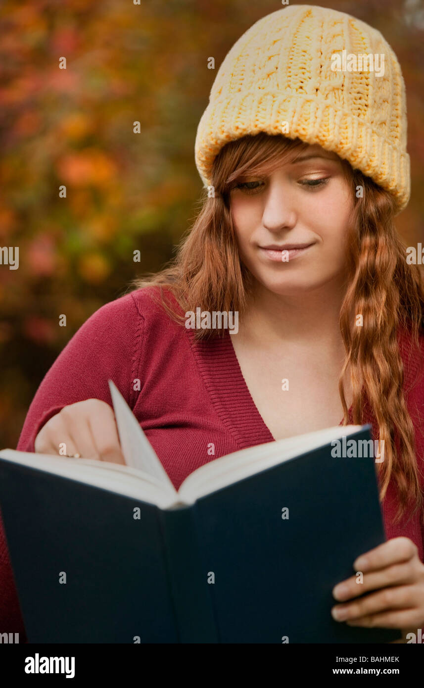 Woman reading a book Stock Photo - Alamy