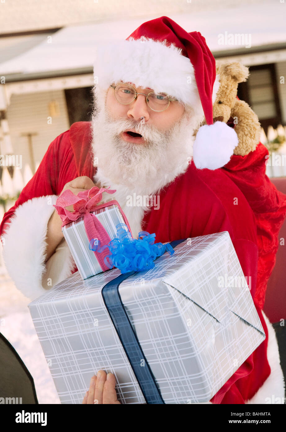Santa Claus with gifts Stock Photo - Alamy