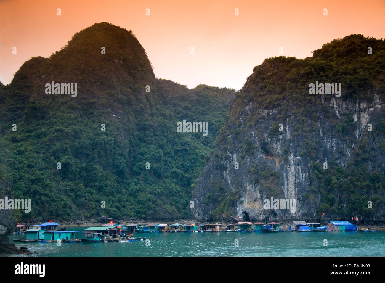 Scenic views of limestone karsts and tourist boats in Ha Long Bay ...