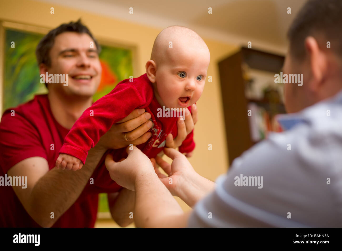 Girls tickling father hi-res stock photography and images - Alamy