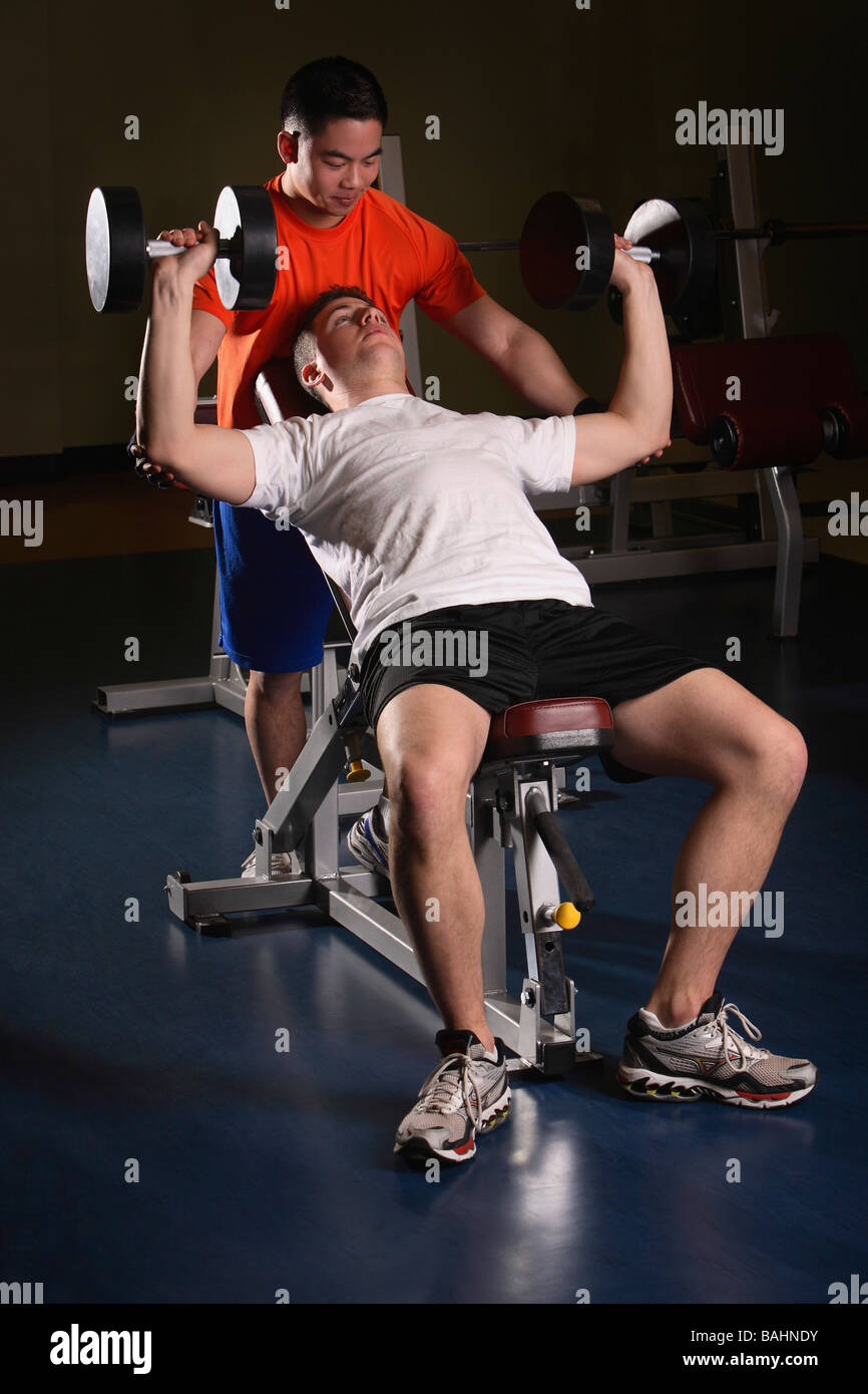 Men lifting weights Stock Photo - Alamy