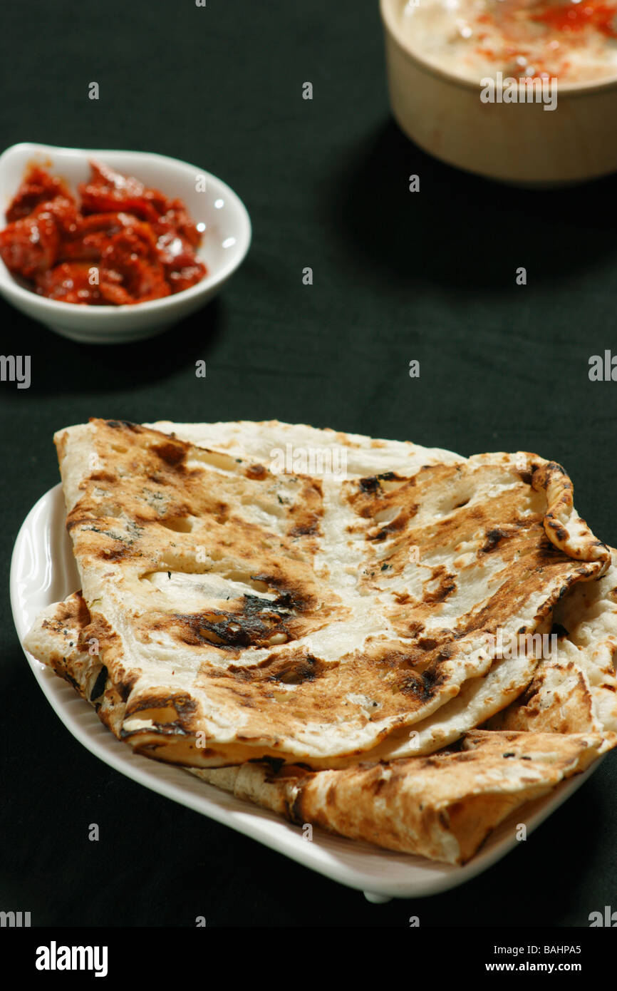 Tandoori Roti is an Indian unleavened bread which is usually made in a ...