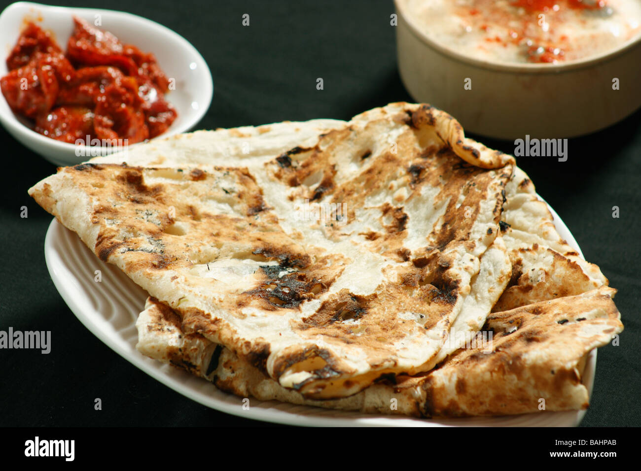 Tandoori Roti is an Indian unleavened bread which is usually made in a ...
