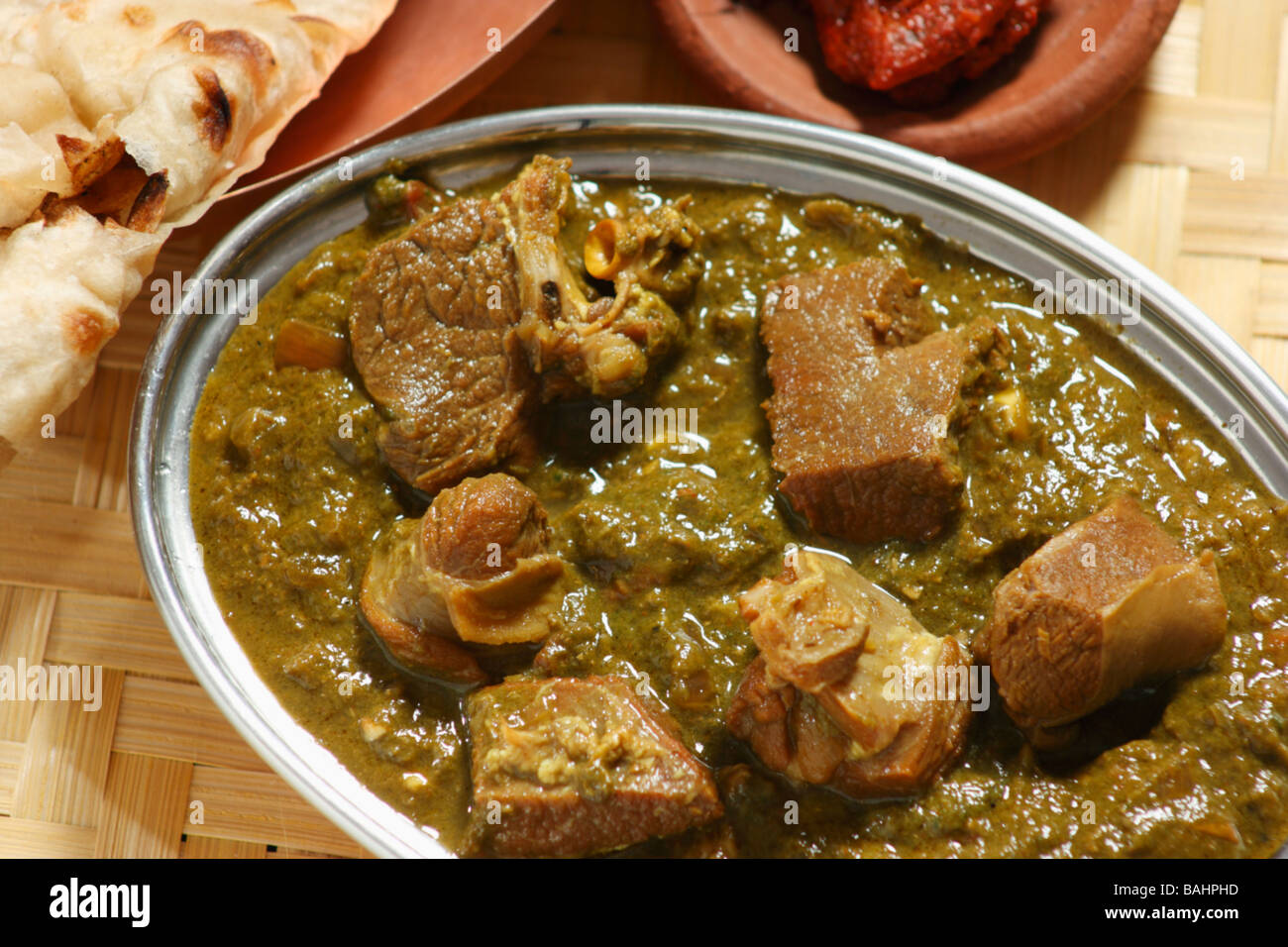 Saag mutton is prepared from mutton cooked in Palak gravy (Spinach) and ...