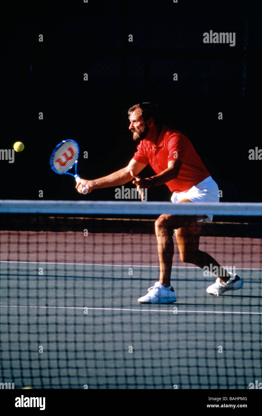 Tennis racket hitting a ball hi-res stock photography and images - Alamy