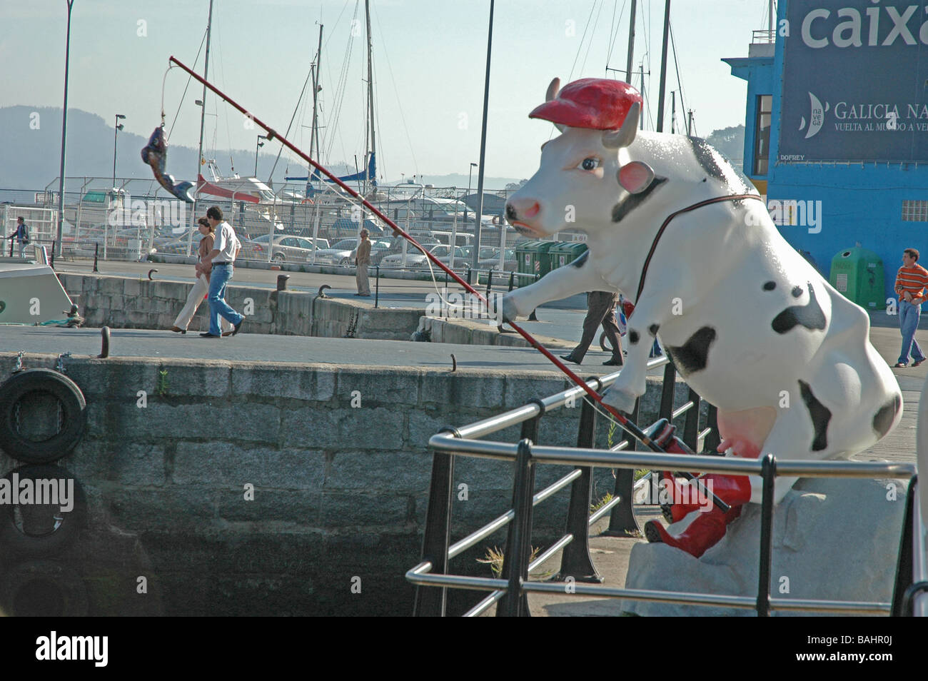 Life size model of cow fishing Stock Photo - Alamy
