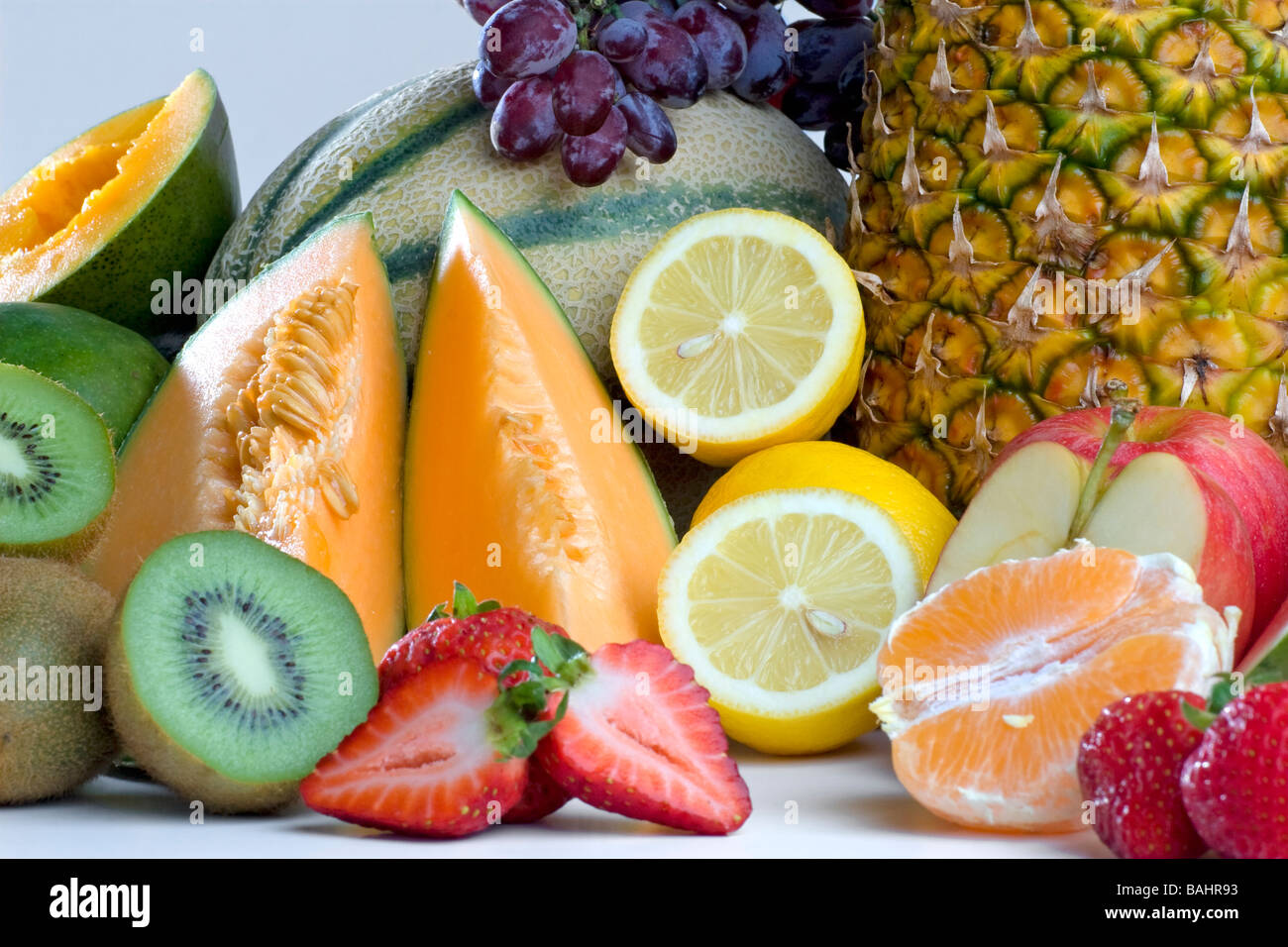 Sliced ftropical fruits Stock Photo - Alamy