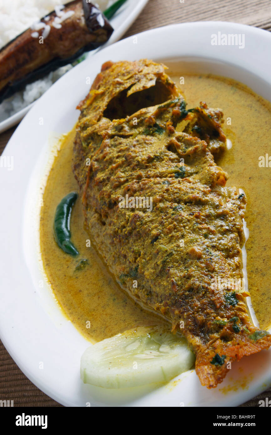 Maacher jhol is a traditional Bengali fish curry Stock Photo - Alamy