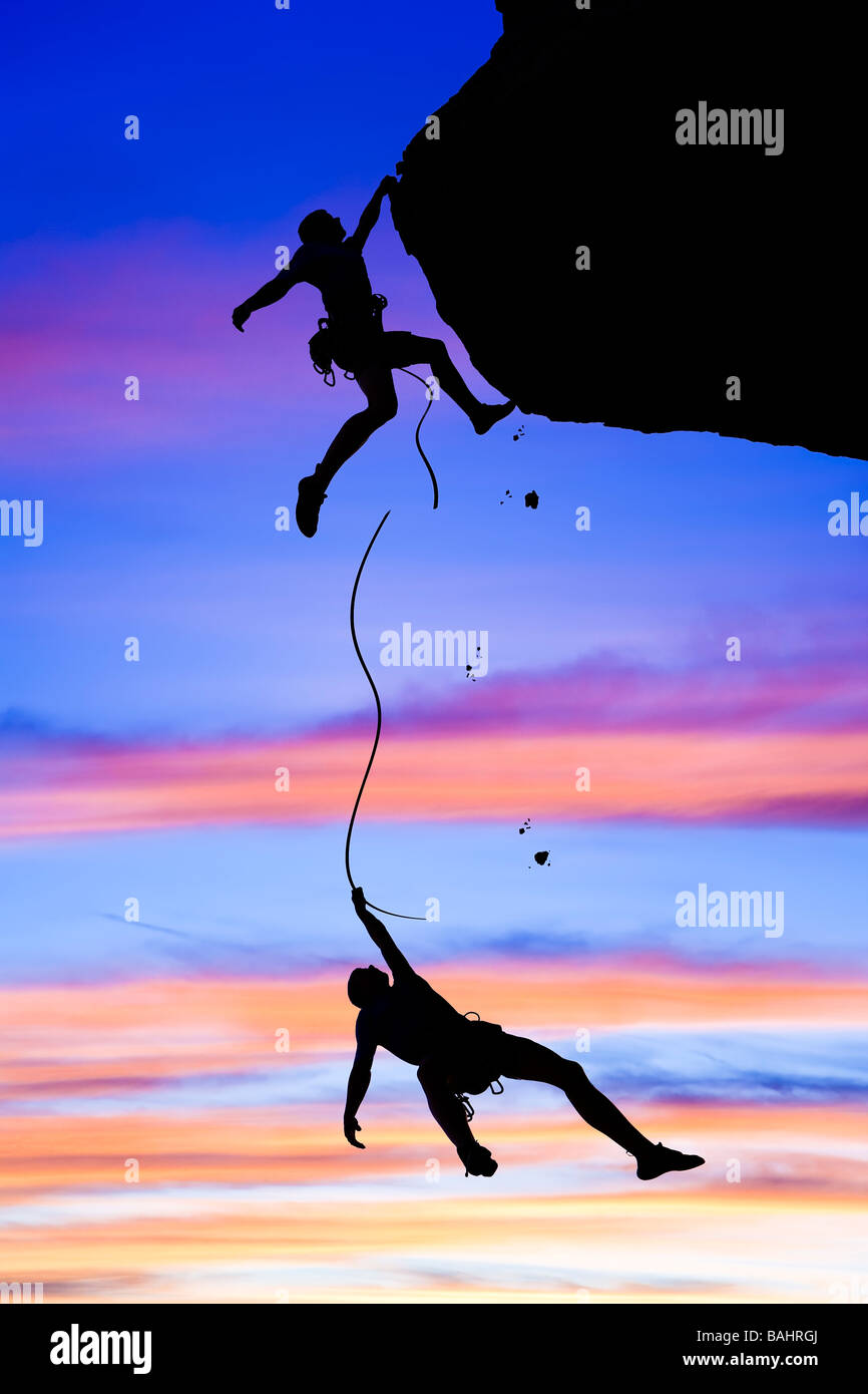 Team of climbers in trouble clinging to a cliff for dear life in The ...