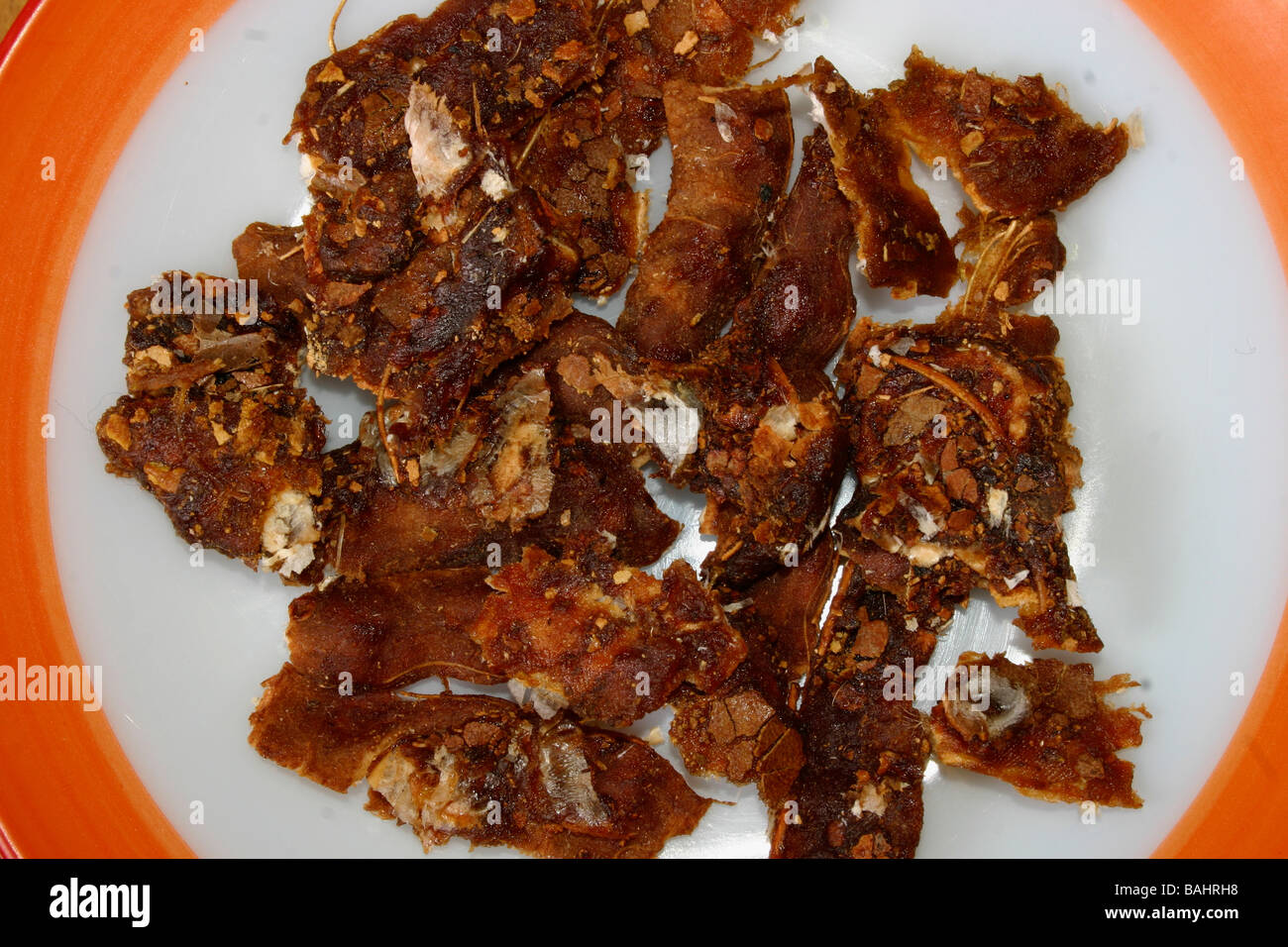 Tamarind is a tangy fruit which often used in Indian cuisine Stock ...