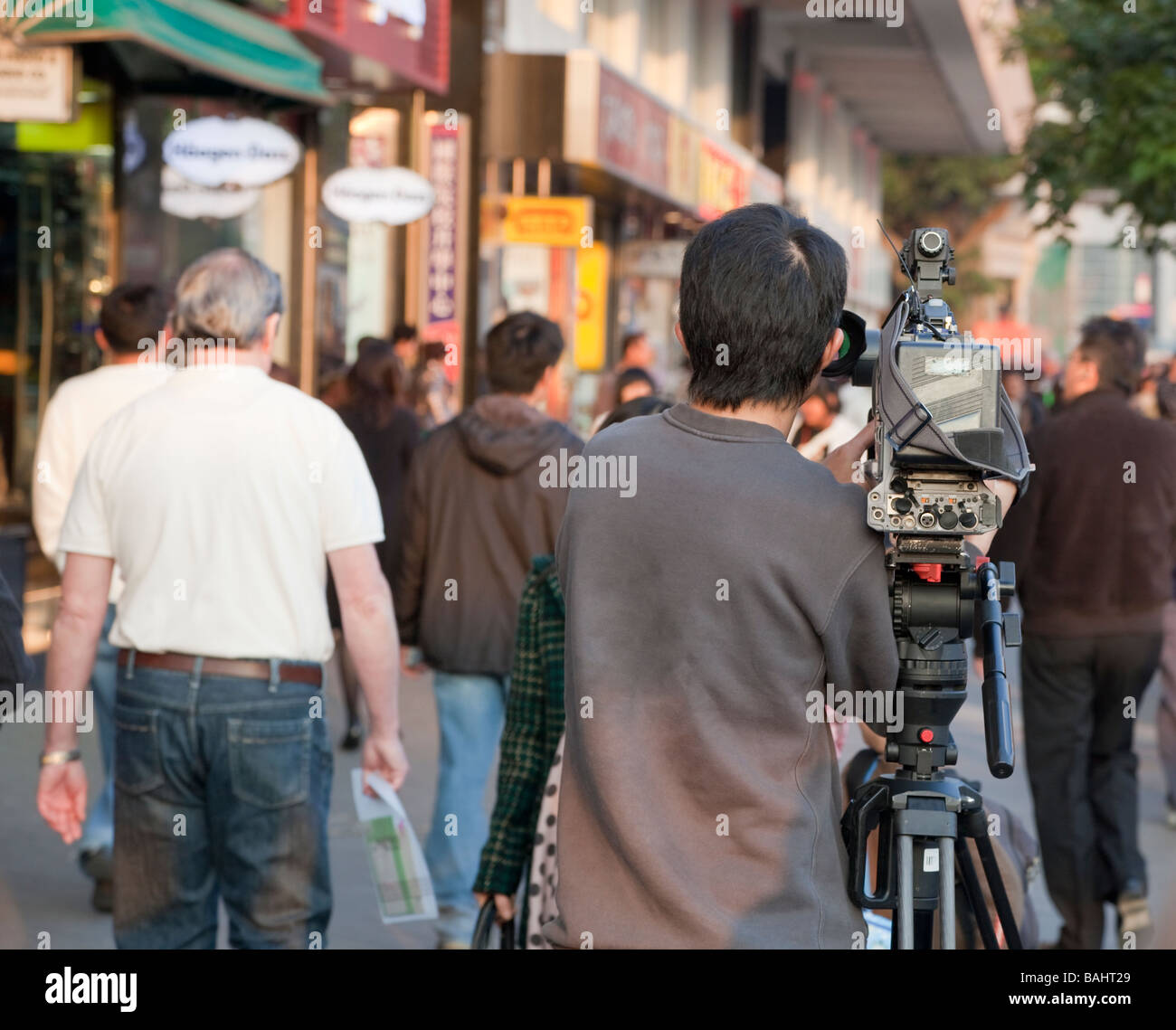 TV Reporter shooting Street Scene Reality TV in Hong Kong China Stock ...