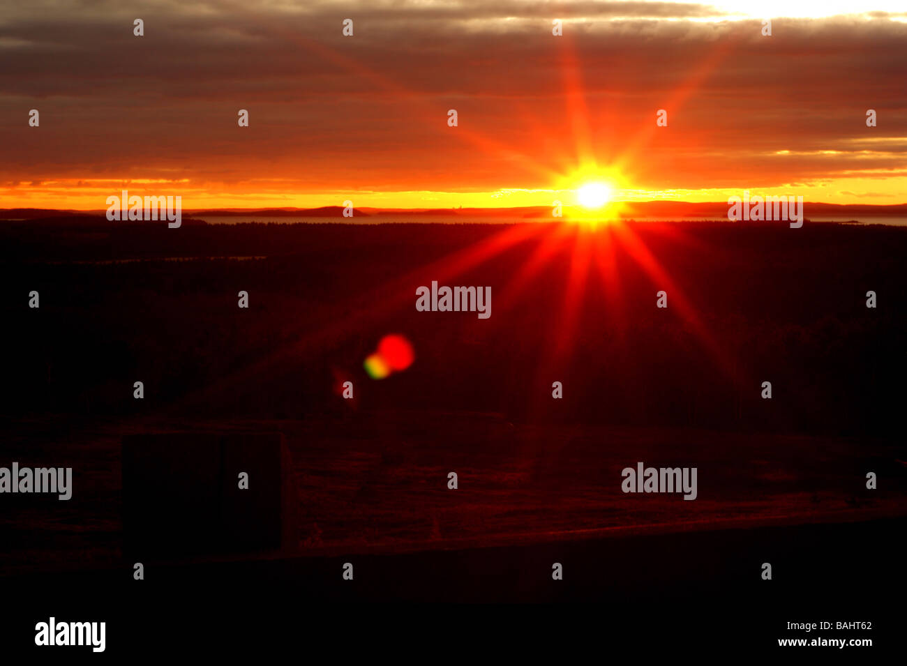 Brilliant sunset on the coast of Maine Stock Photo - Alamy