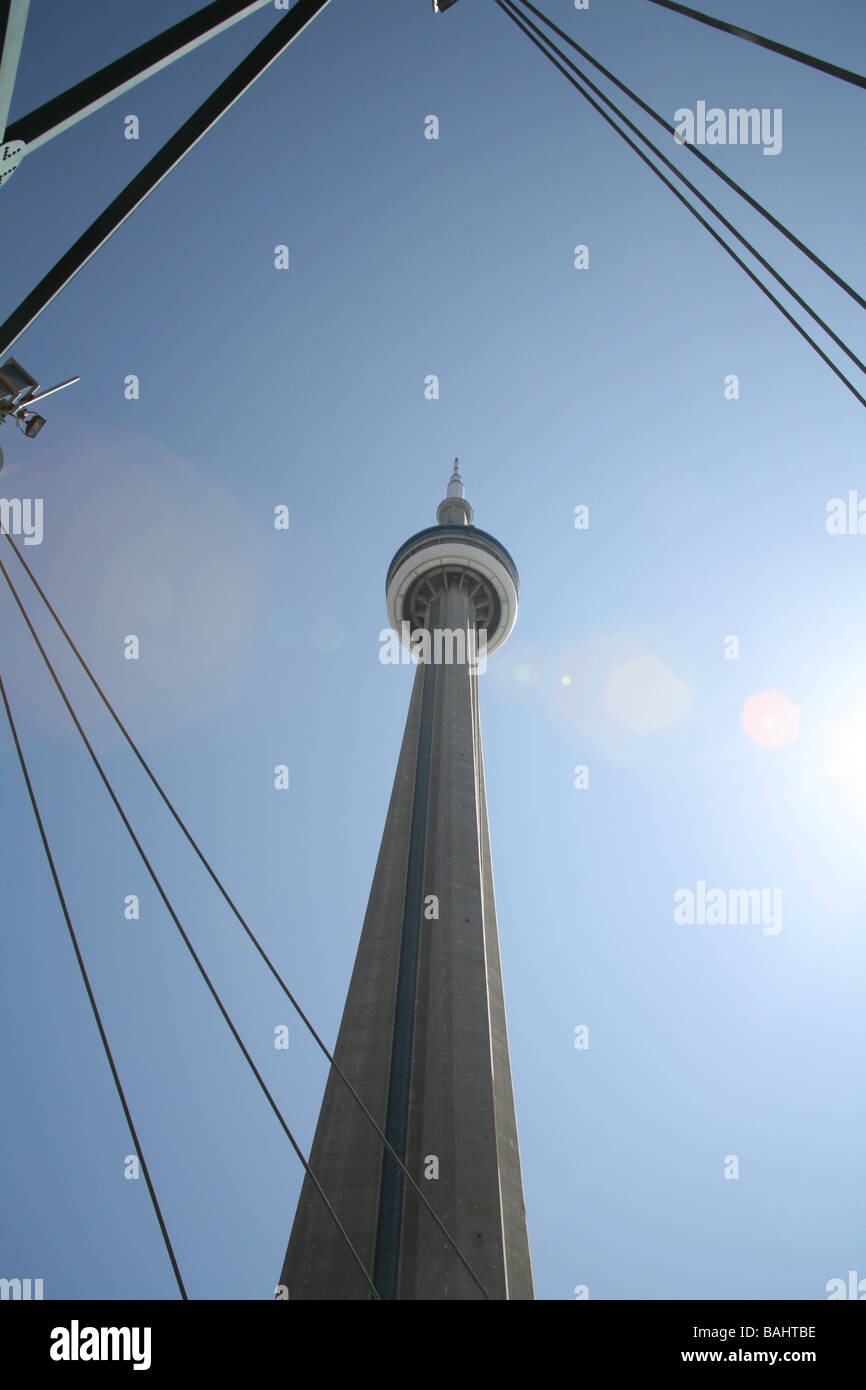 Sunny blue sky over Canadian National Tower, Toronto, Canada, low angle ...