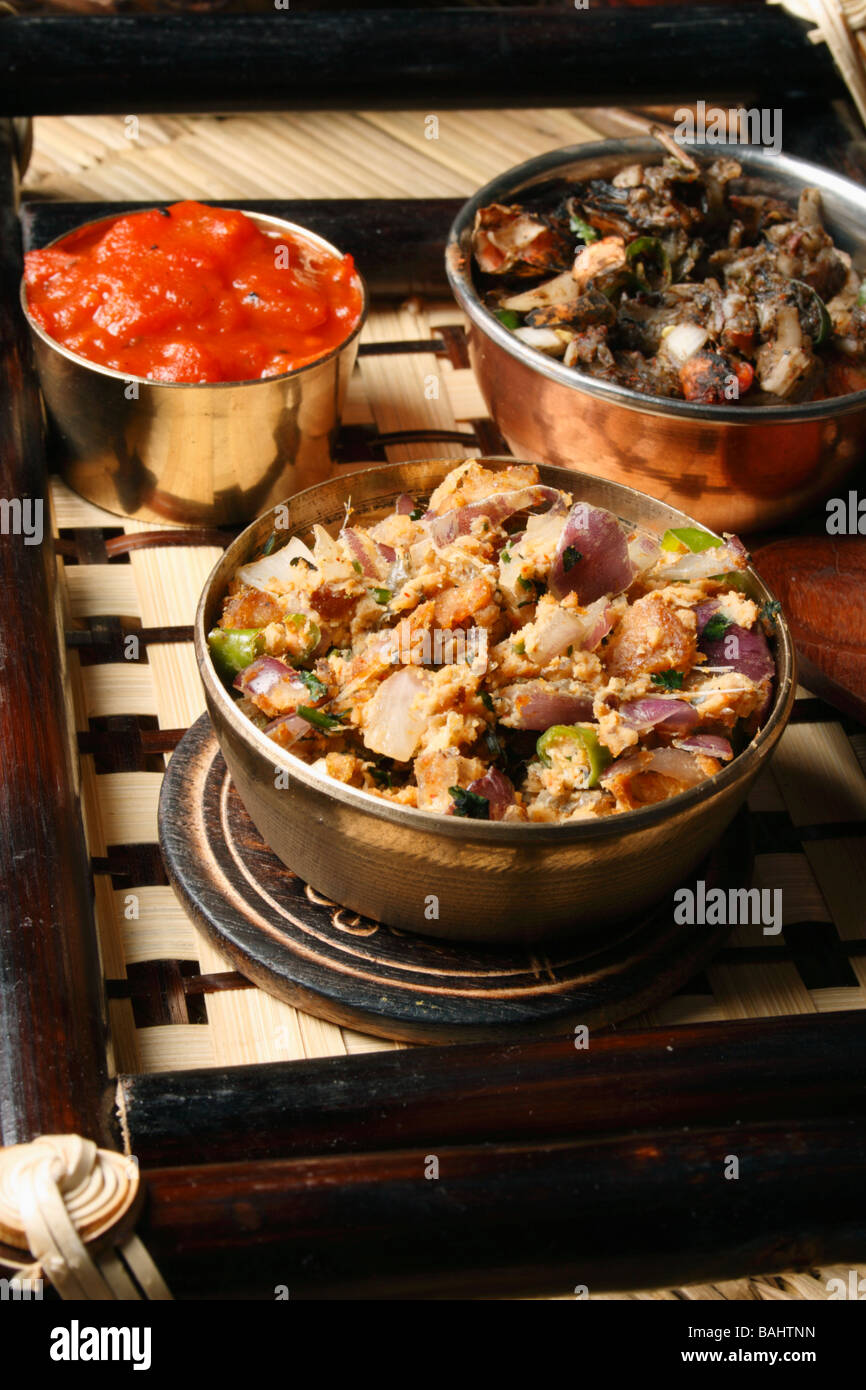 Poora mach is a fish prepared in barbeque or open charcoal fire Stock ...