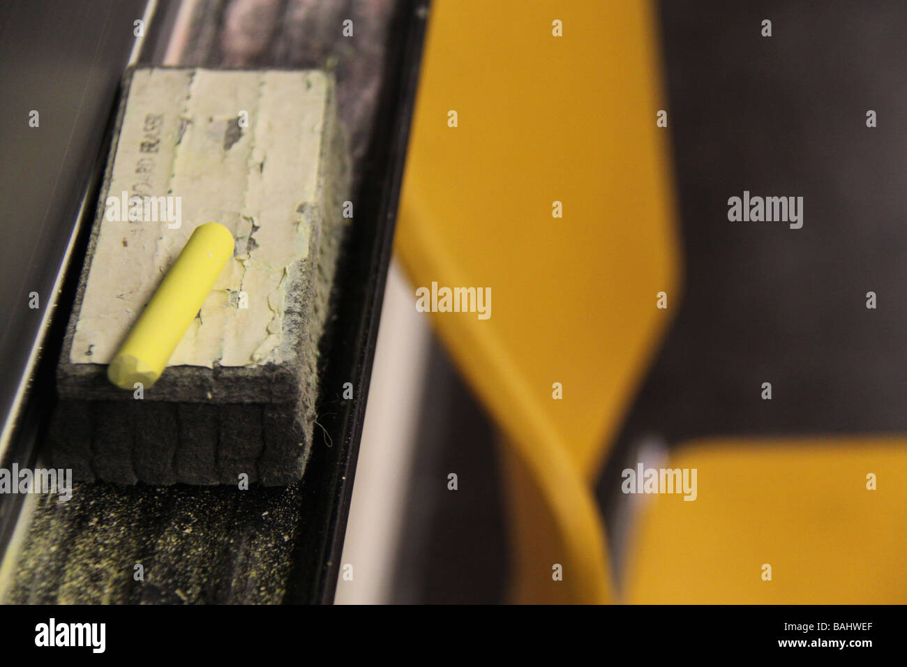 Blackboard, chalk and chair in a classroom in Hunter College, New York ...