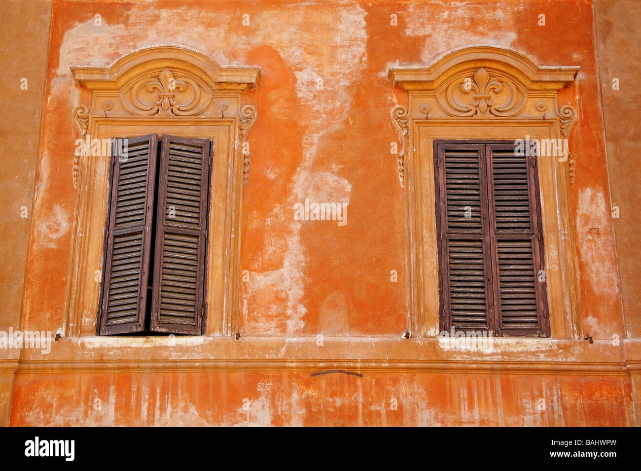 Rome, Italy; Two windows with shutters Stock Photo - Alamy