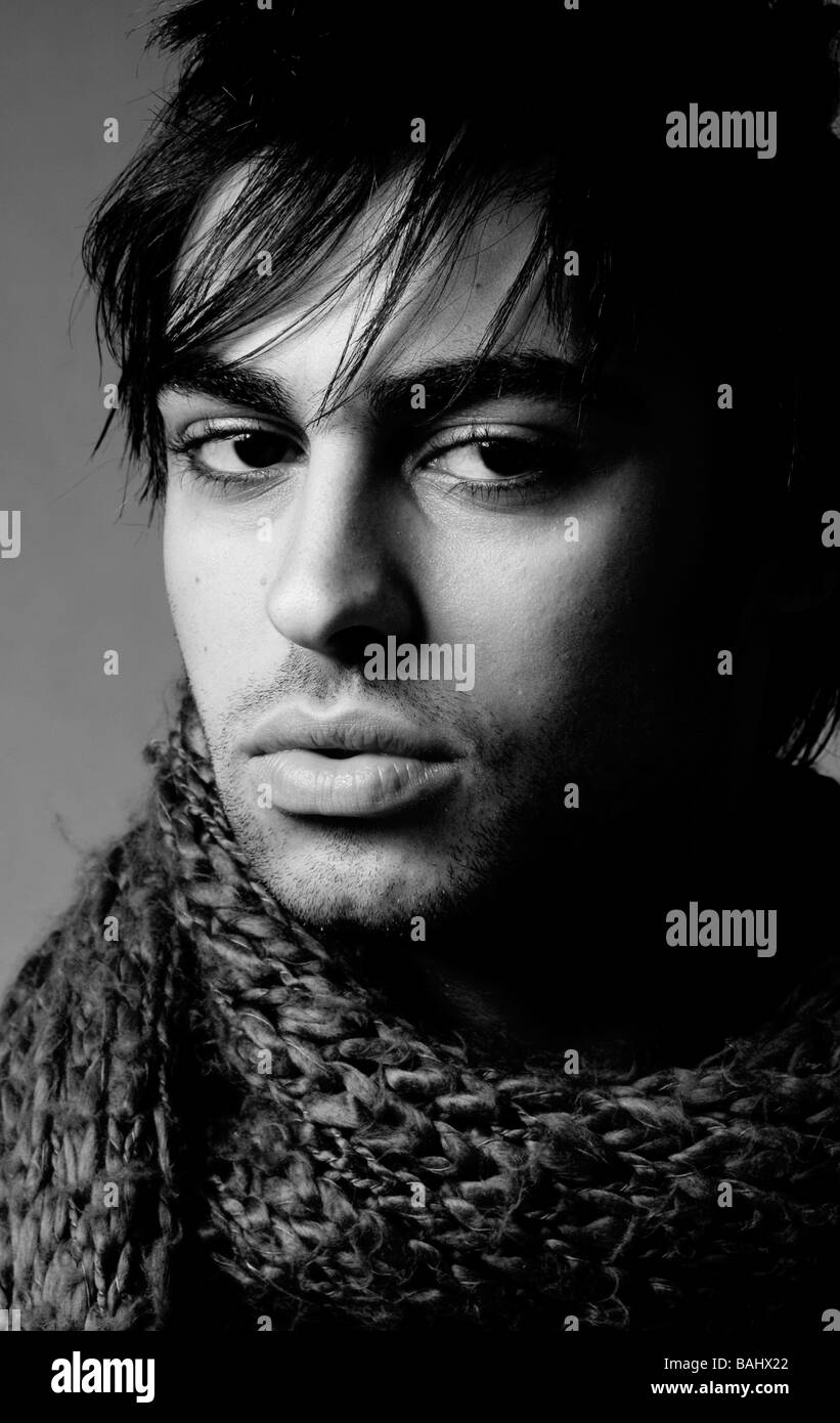 Male model in black and white with scarf Stock Photo - Alamy