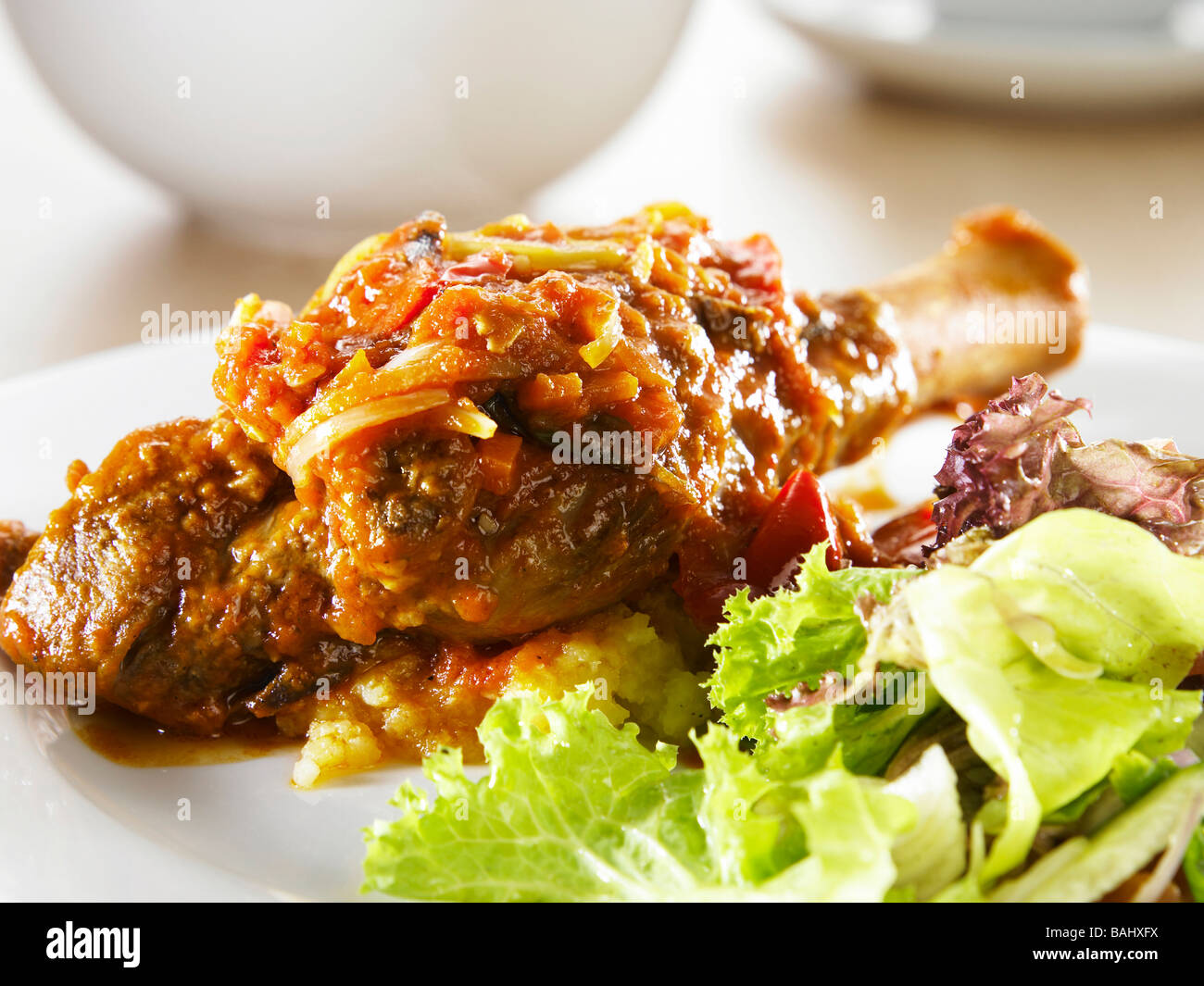 main course of lamb shank ready to eat Stock Photo - Alamy