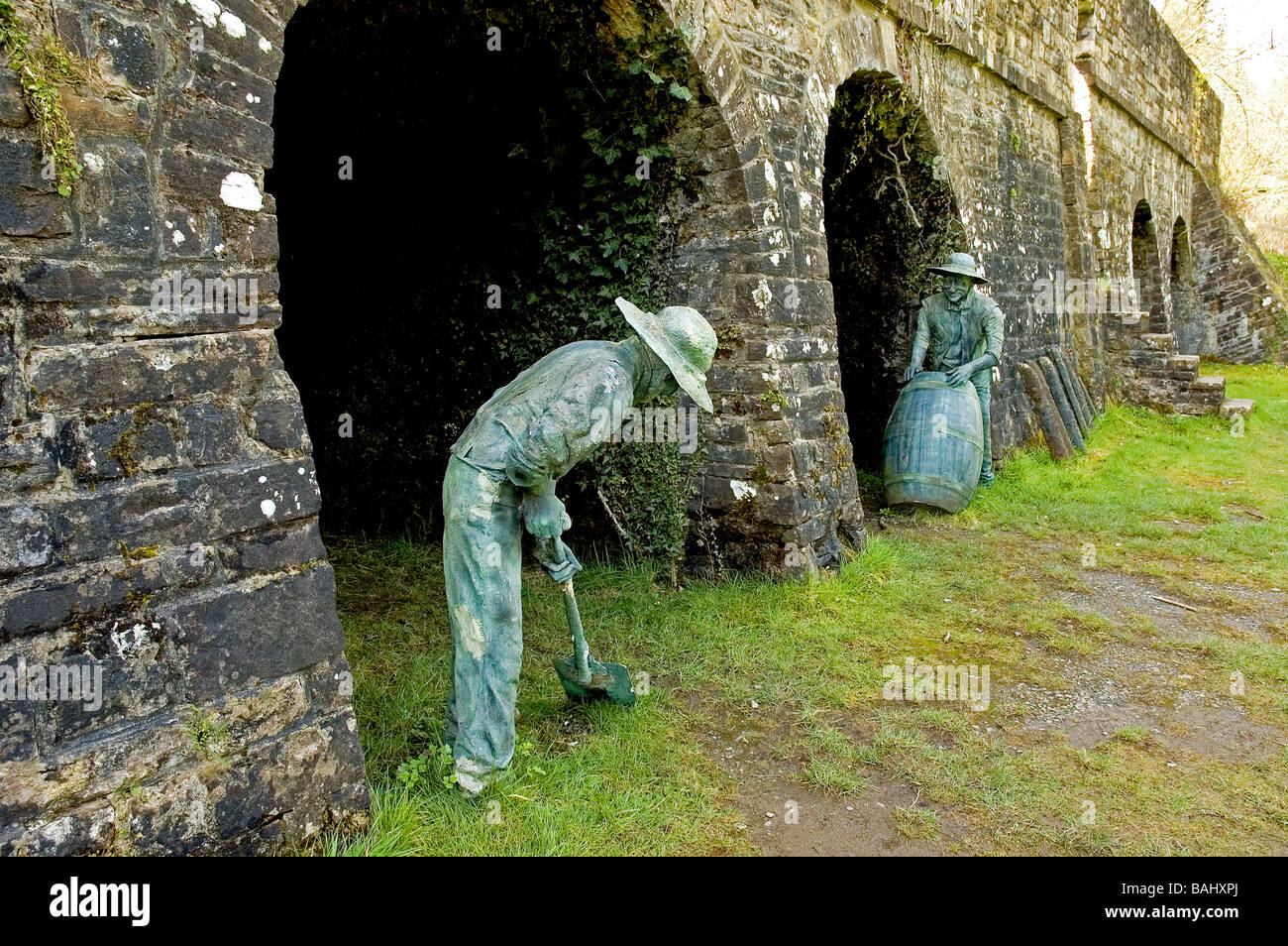 Statues of lime kiln workers Goytre Wharf South Wales U.K Stock Photo ...