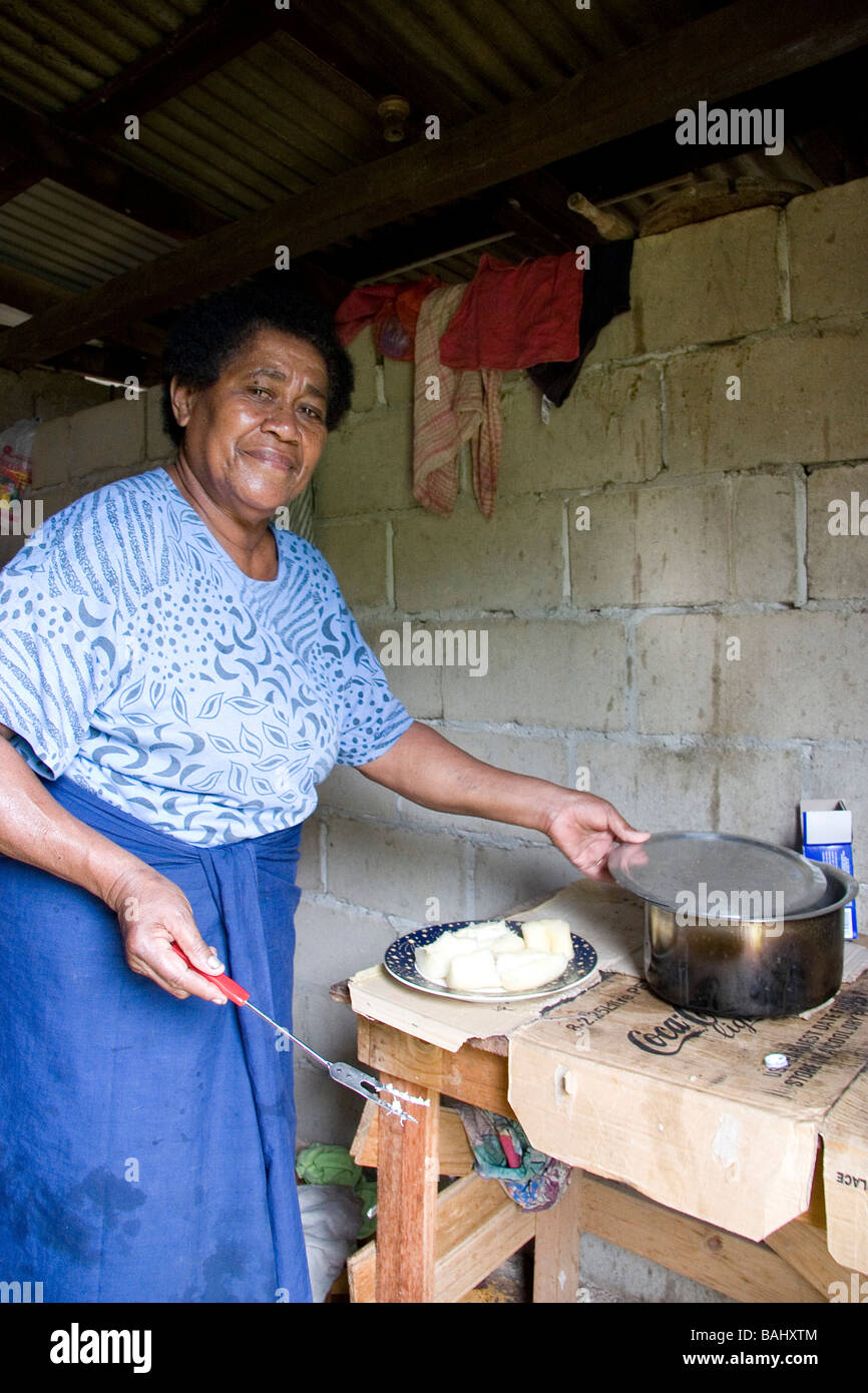 Woman cooking in Fiji village Stock Photo - Alamy