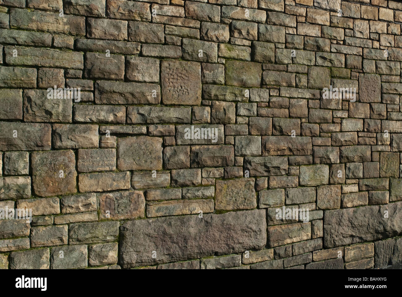 A wall made of natural stone bricks Stock Photo - Alamy